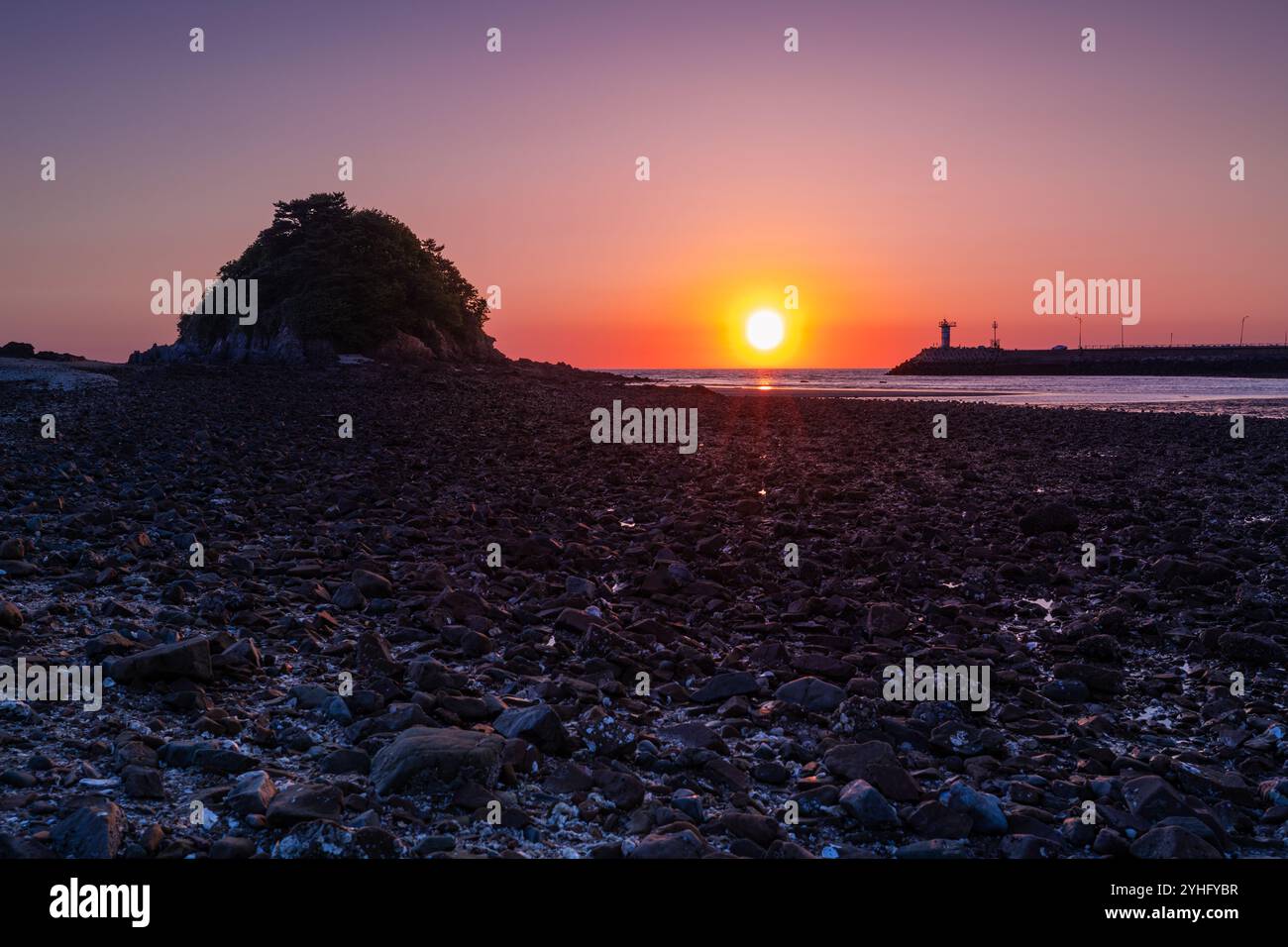 Beautiful sunset over the sea. Grandmother and Grandfather Rocks at ...