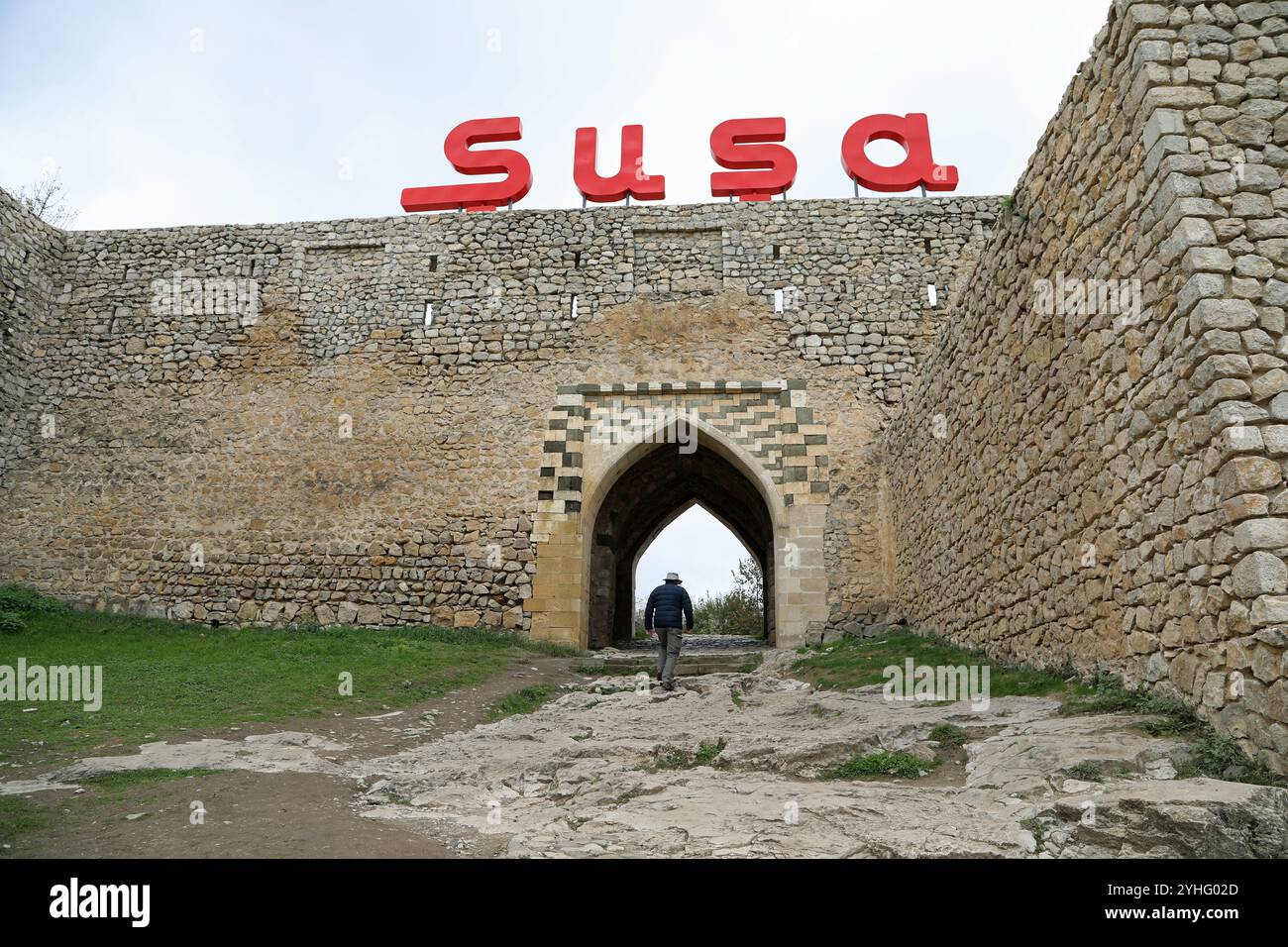 Tourist walking towards the Ganja Gate of Shusha Fortress in the ...