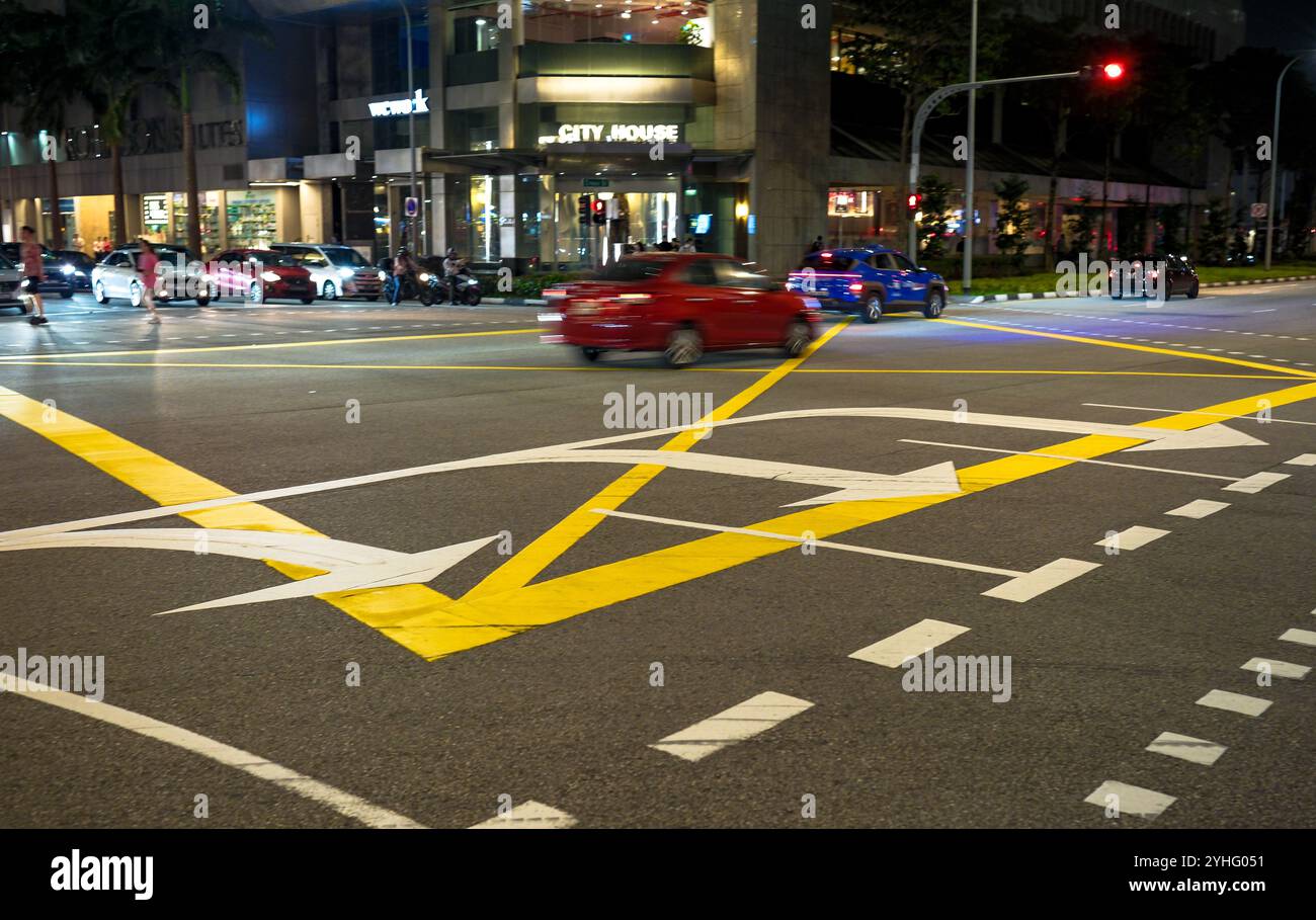 Yellow road markings box junction in Singapore Asia Chinatown area ...