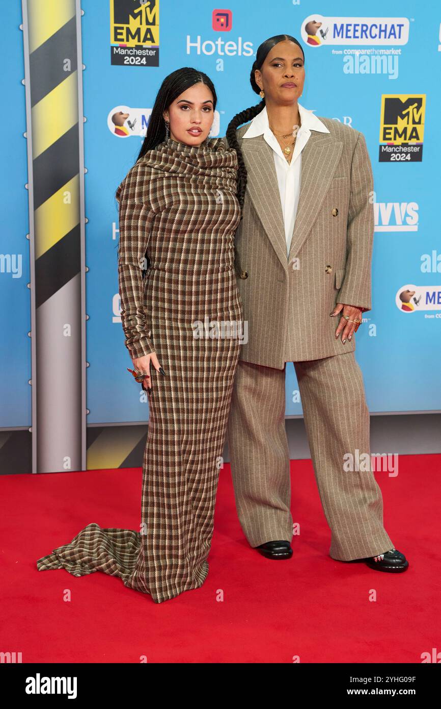 Mabel, from left, and Neneh Cherry pose for photographers upon arrival at the MTV European Music ...