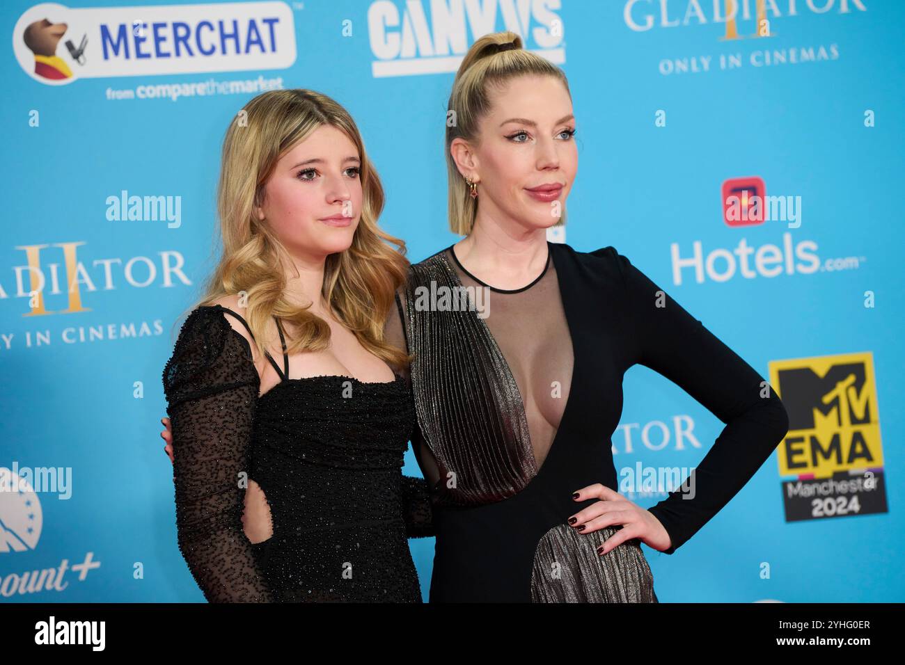 Violet Ryan, from left, and Katherine Ryan pose for photographers upon ...