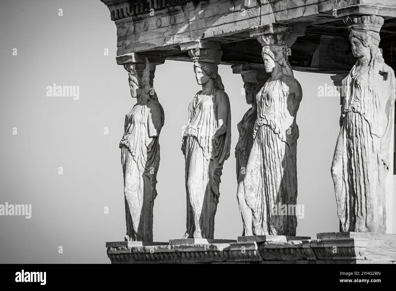The iconic Caryatids of the Erechtheion on the Acropolis, Athens, Greece, showcasing ancient ...