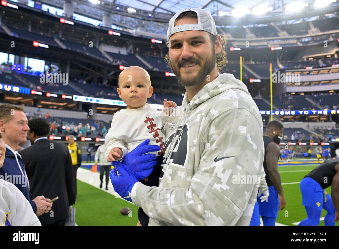 Los Angeles Rams tight end Colby Parkinson holds his son Forrest prior ...
