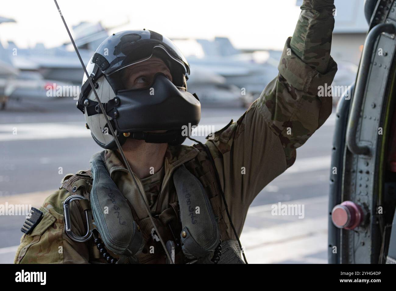 Naval Air Crewman (Helicopter) Chief Robert Nilson, assigned to the ...