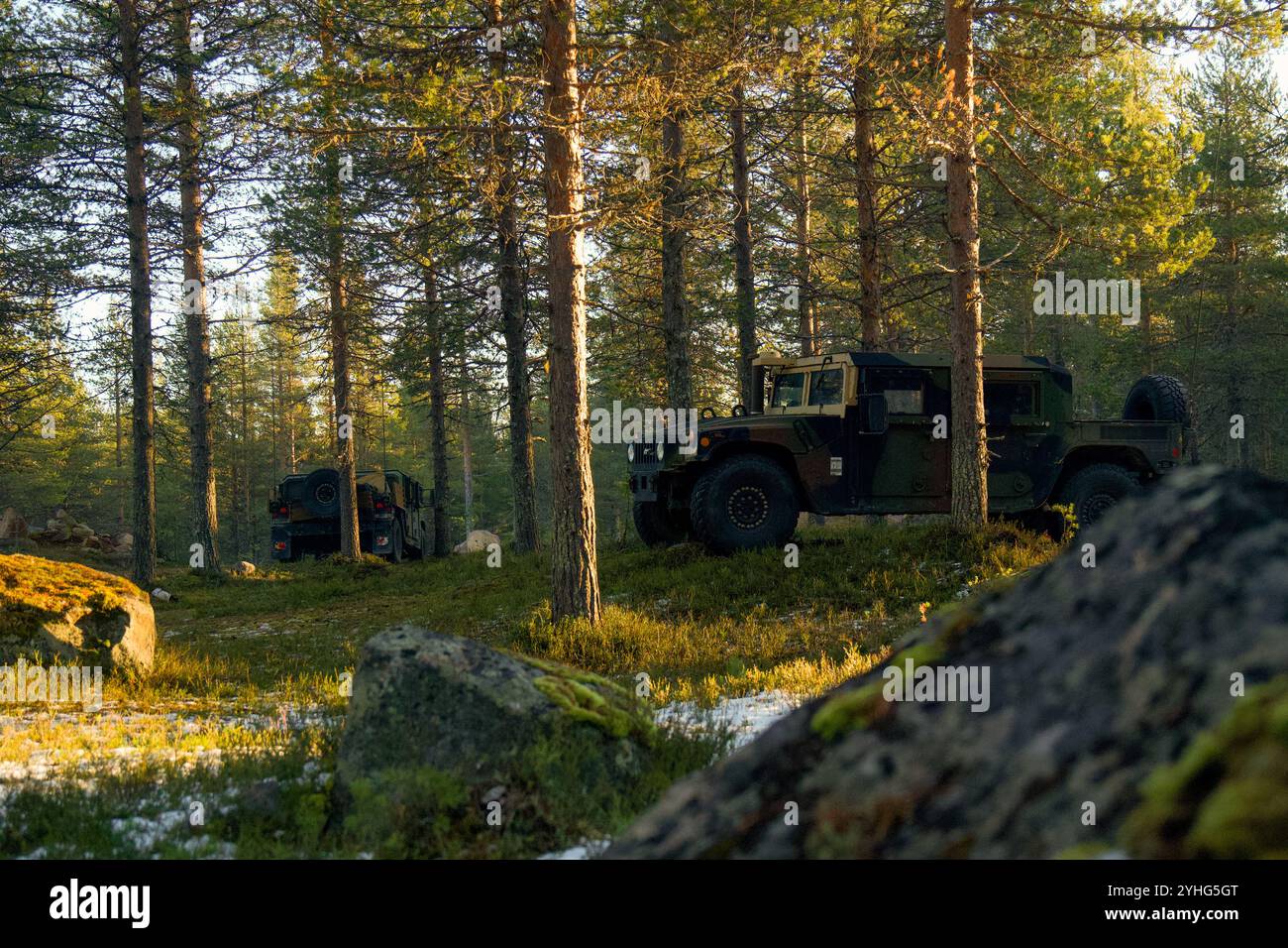 U.S. Army Humvees, assigned to the 41st Field Artillery Brigade, stage ...