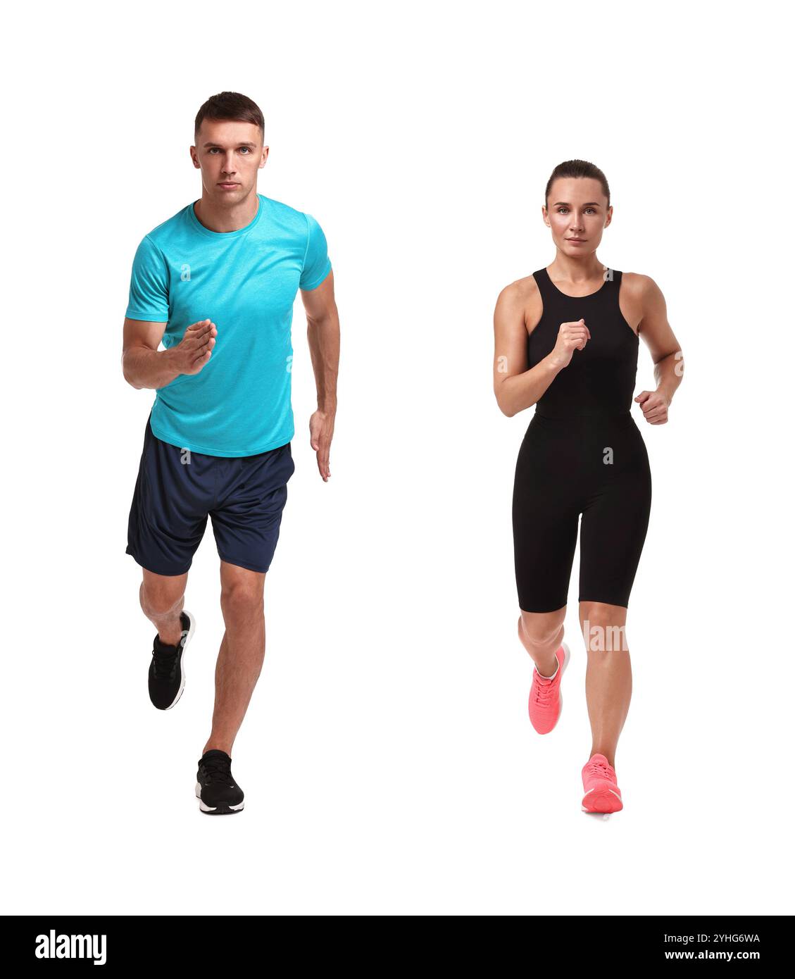 Athletic man and woman in sportswear running on white background Stock ...
