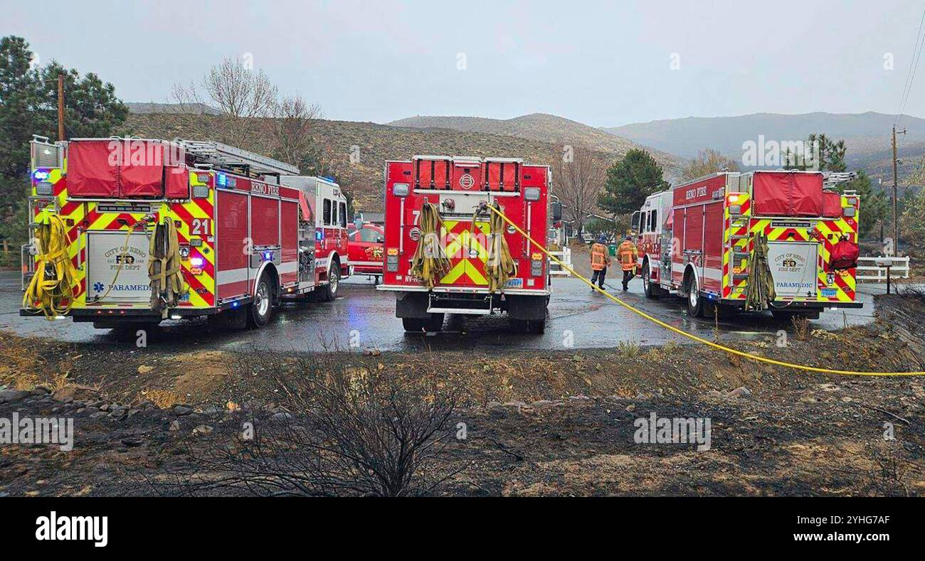 In this handout photo provided by the Reno Fire Department, fire crews ...