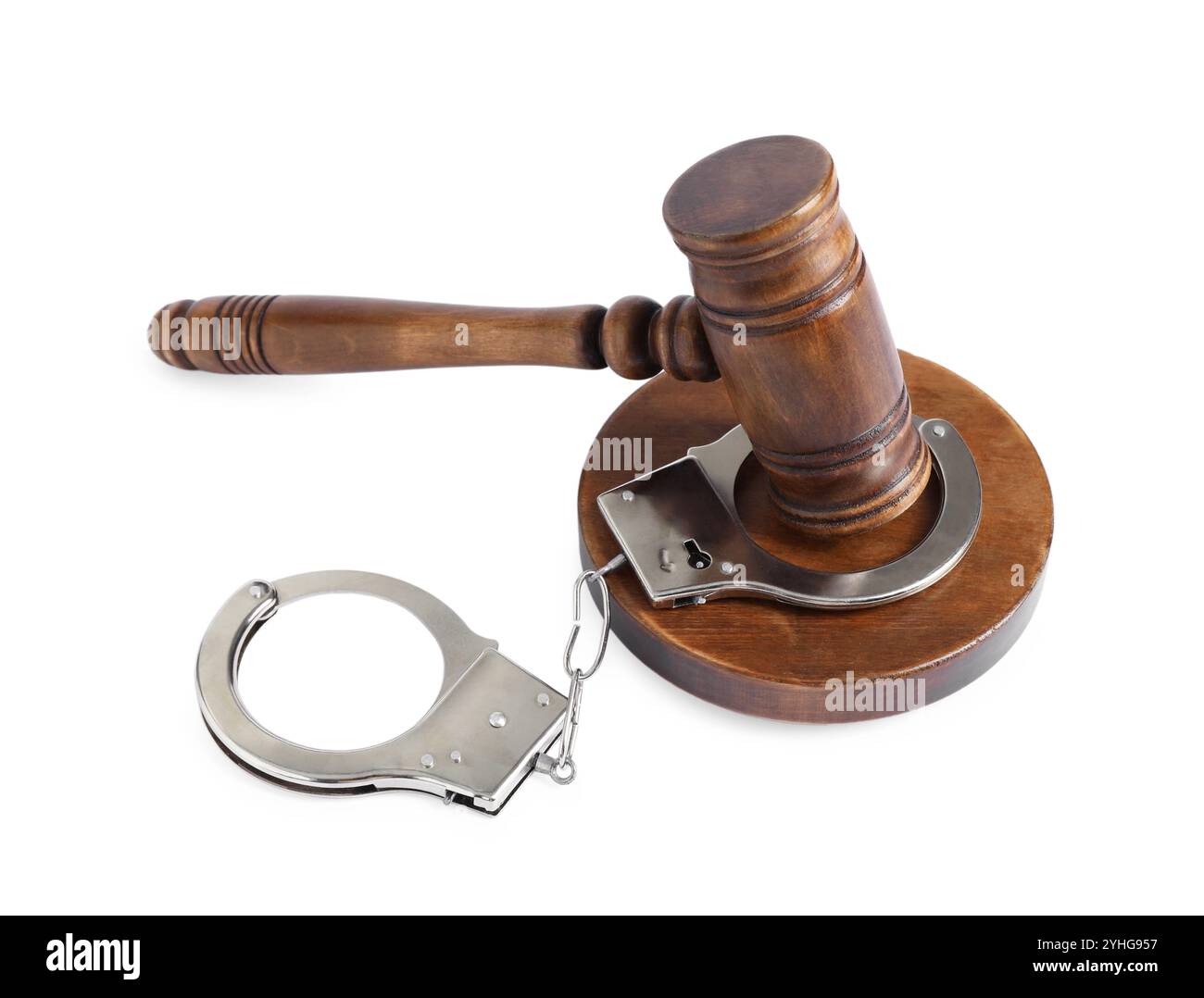 Handcuffs and judge's gavel isolated on white Stock Photo - Alamy