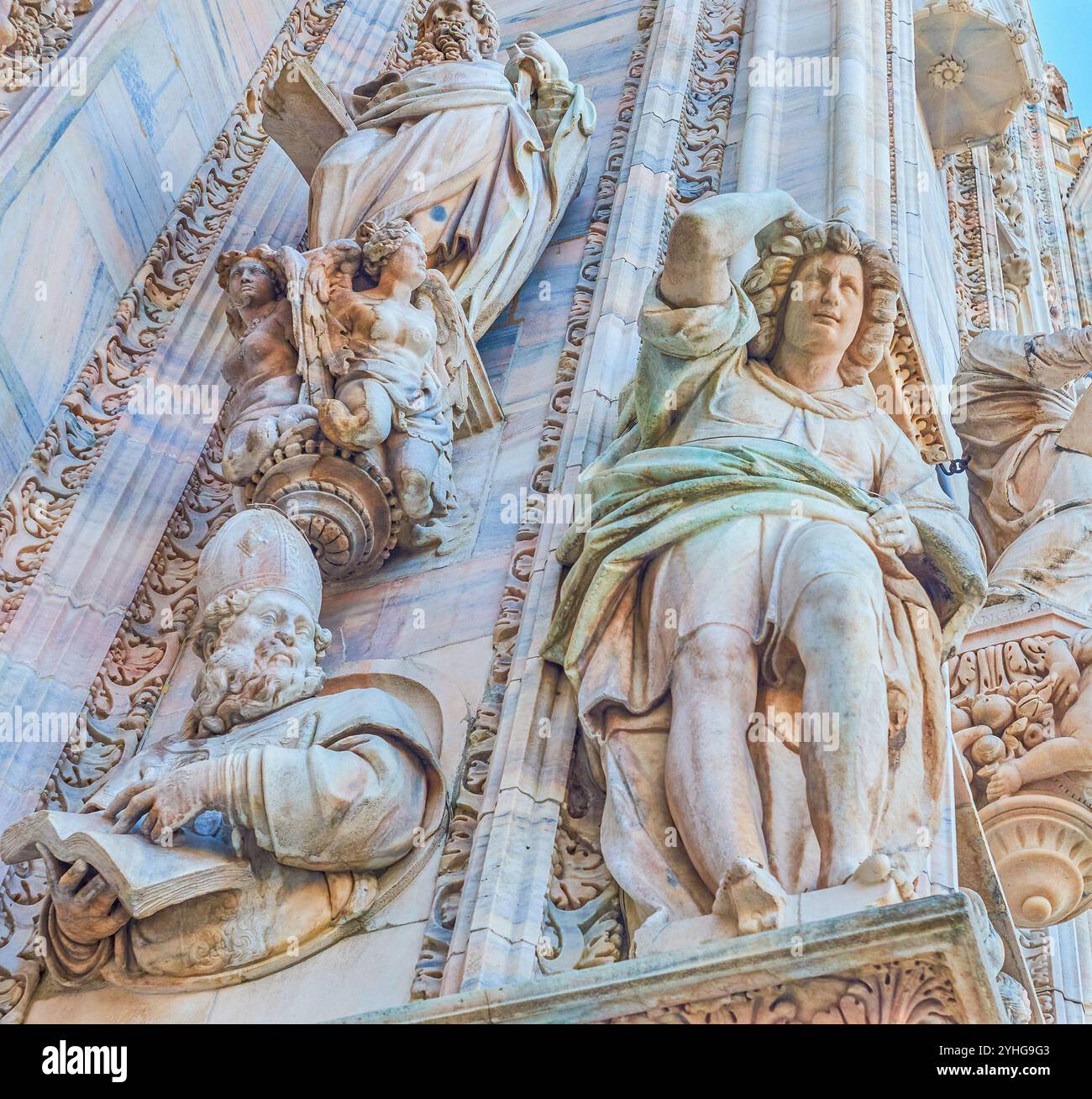 The scenic marble sculptures on the facade of Milan Cathedral, Italy ...