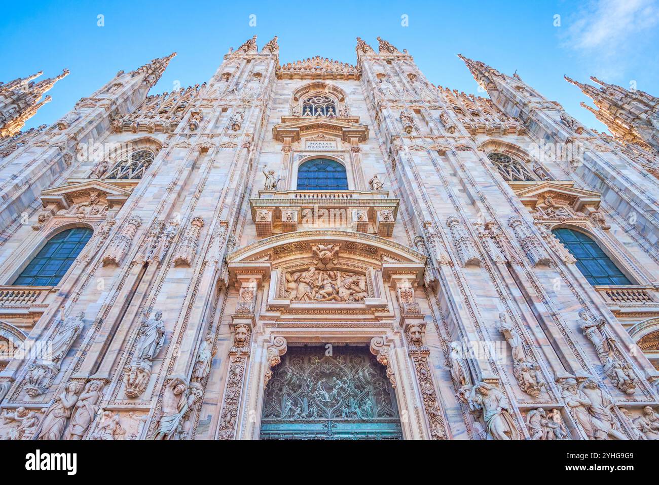 Ornate sculptured stone facade of historic Duomo di Milano (Milan ...