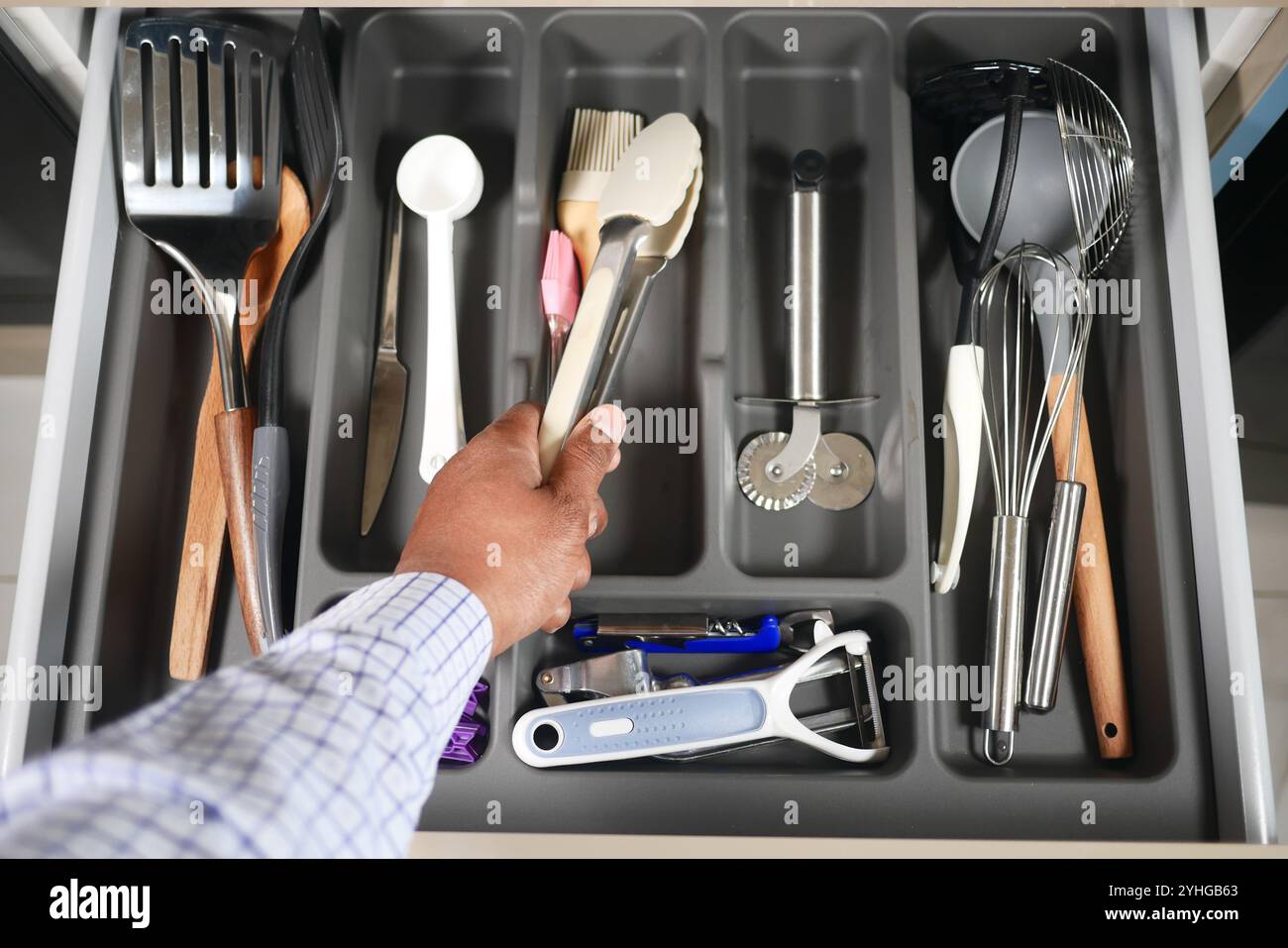 Discover an Organized Kitchen Drawer Filled with Essential Cooking ...
