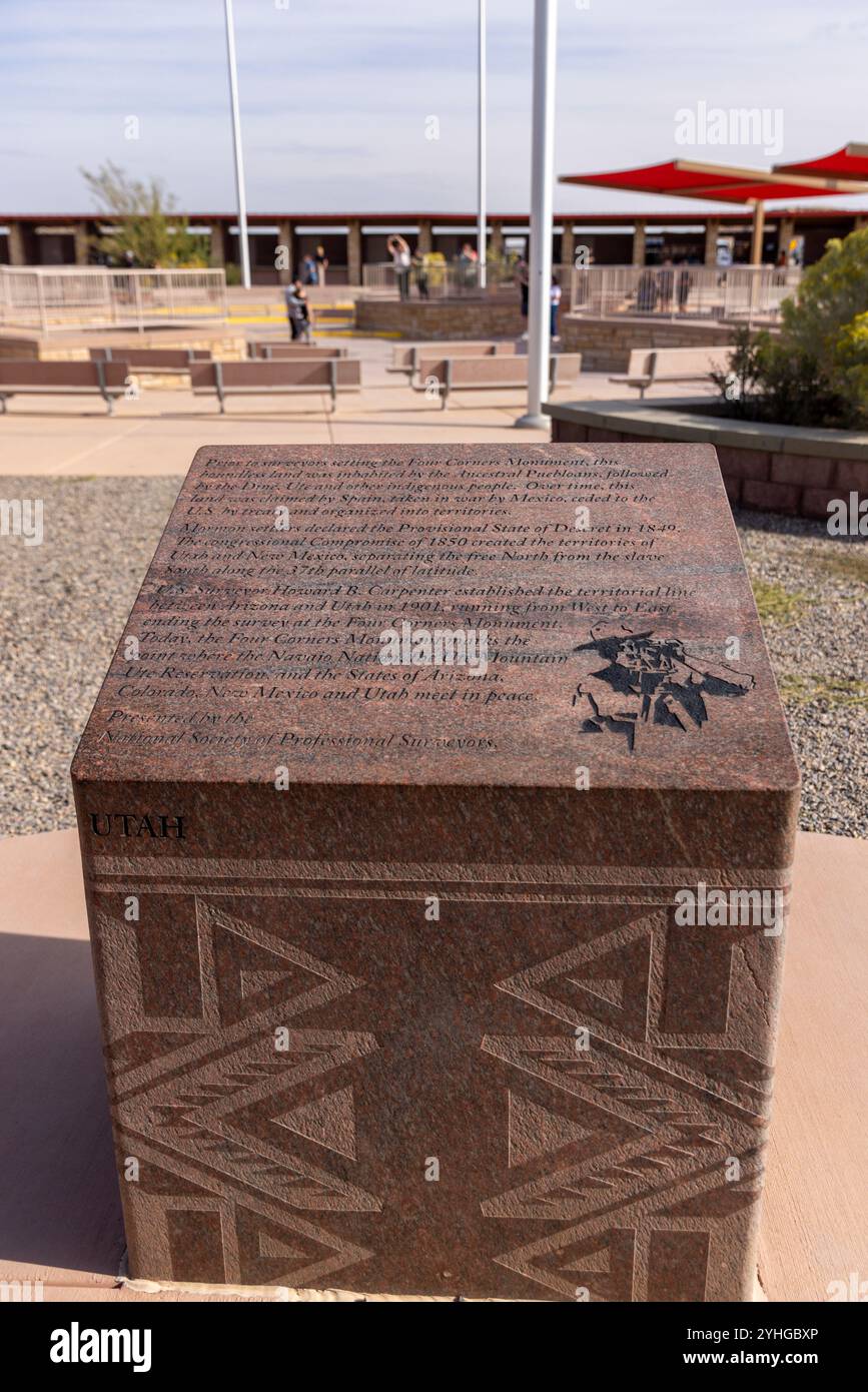Visitors to the Four Corners Monument, the only place in the United ...