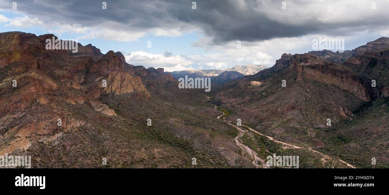 The Apache Trail twisting below the high rugged peaks of the ...