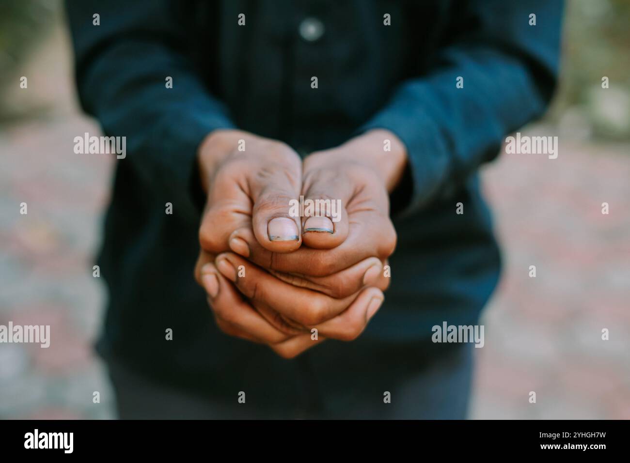 Hands cupped together hi-res stock photography and images - Alamy