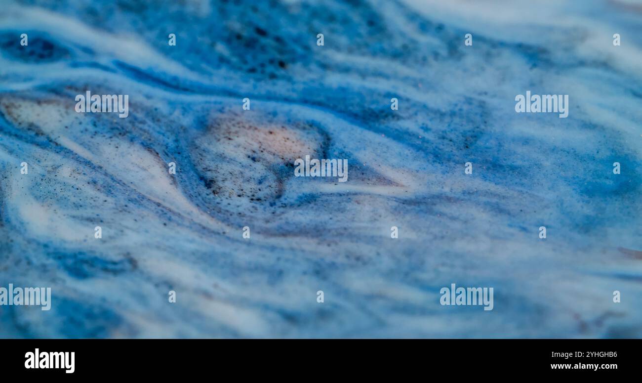 Marble flow. Wavy enamel. Disturbance of opaque paint. Pouring colored ...