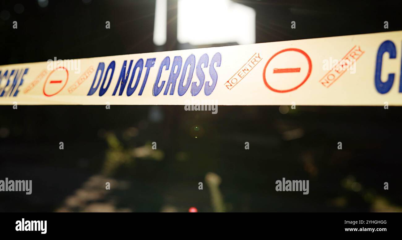 Crime scene, police tape and danger in building for investigation with ...