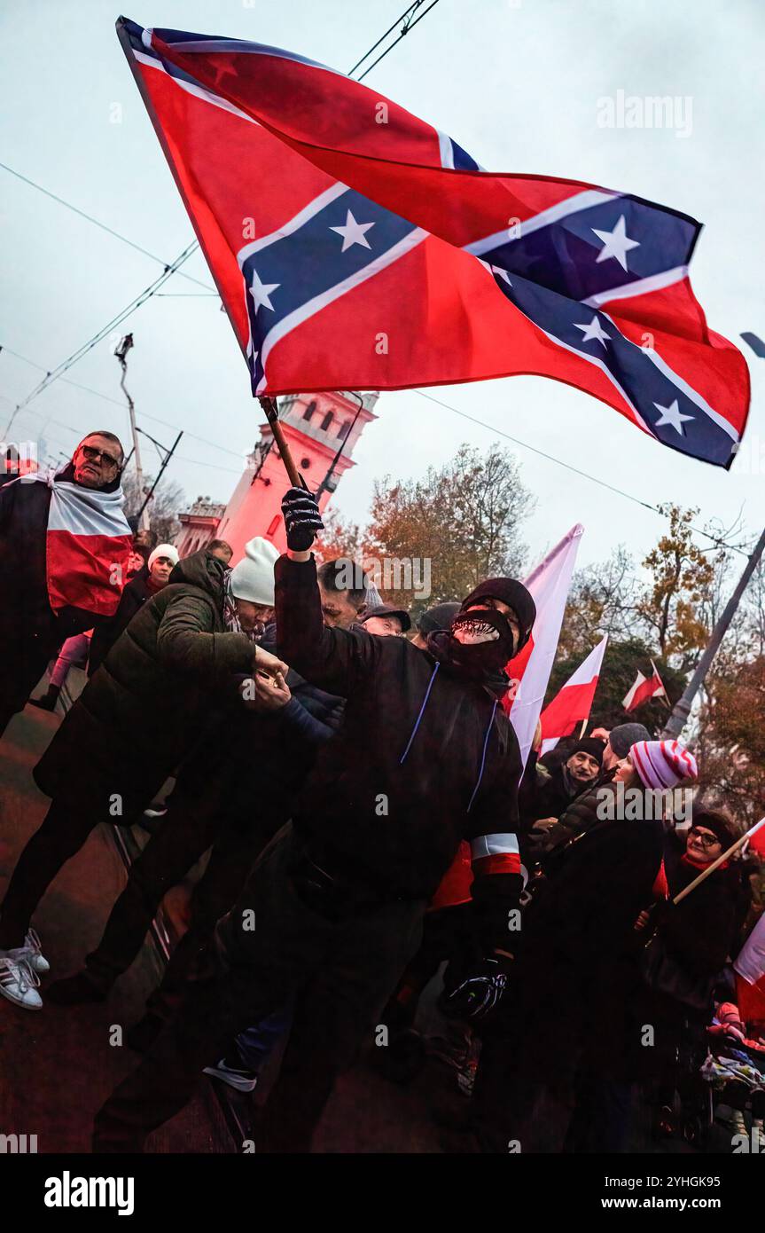 A nationalist participant waves the Confederate States of America's ...