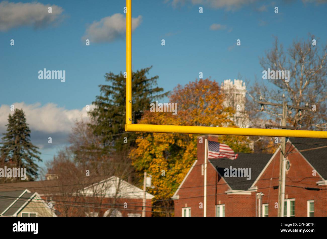 Football field goal post with American flag Stock Photo - Alamy