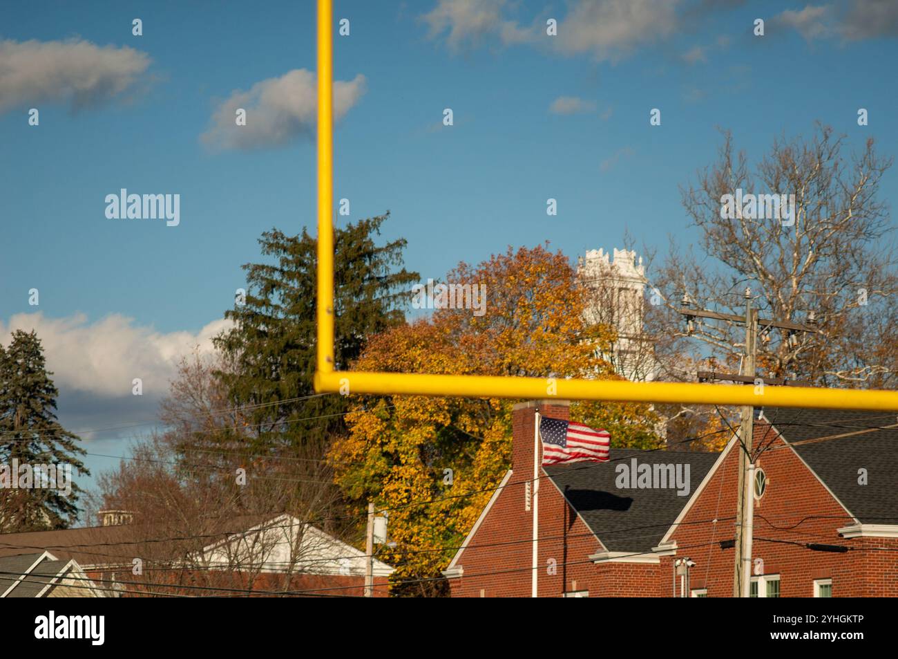 Football field goal post with American flag Stock Photo - Alamy
