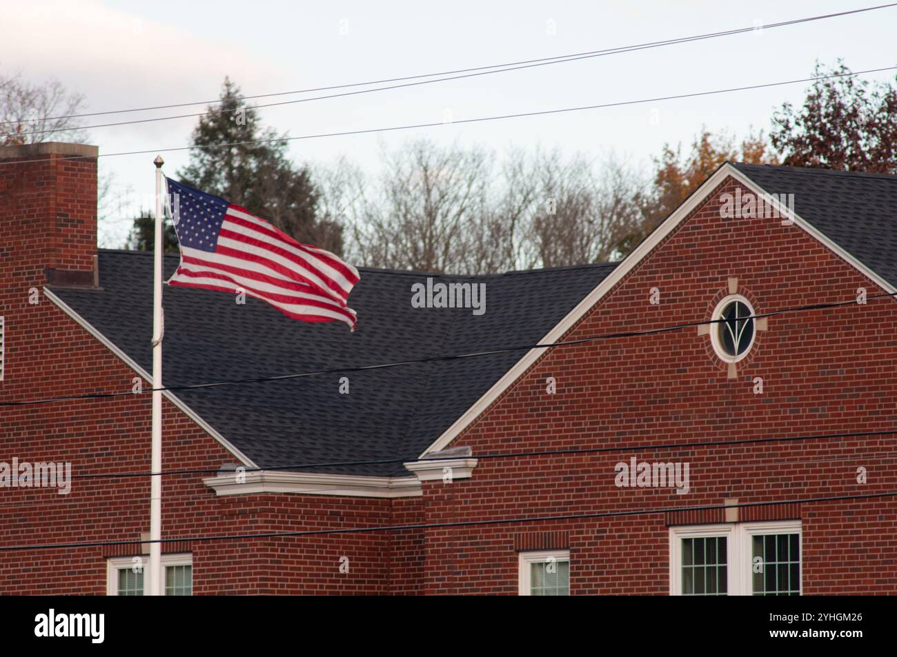 American flag waving in neighborhood hi-res stock photography and ...
