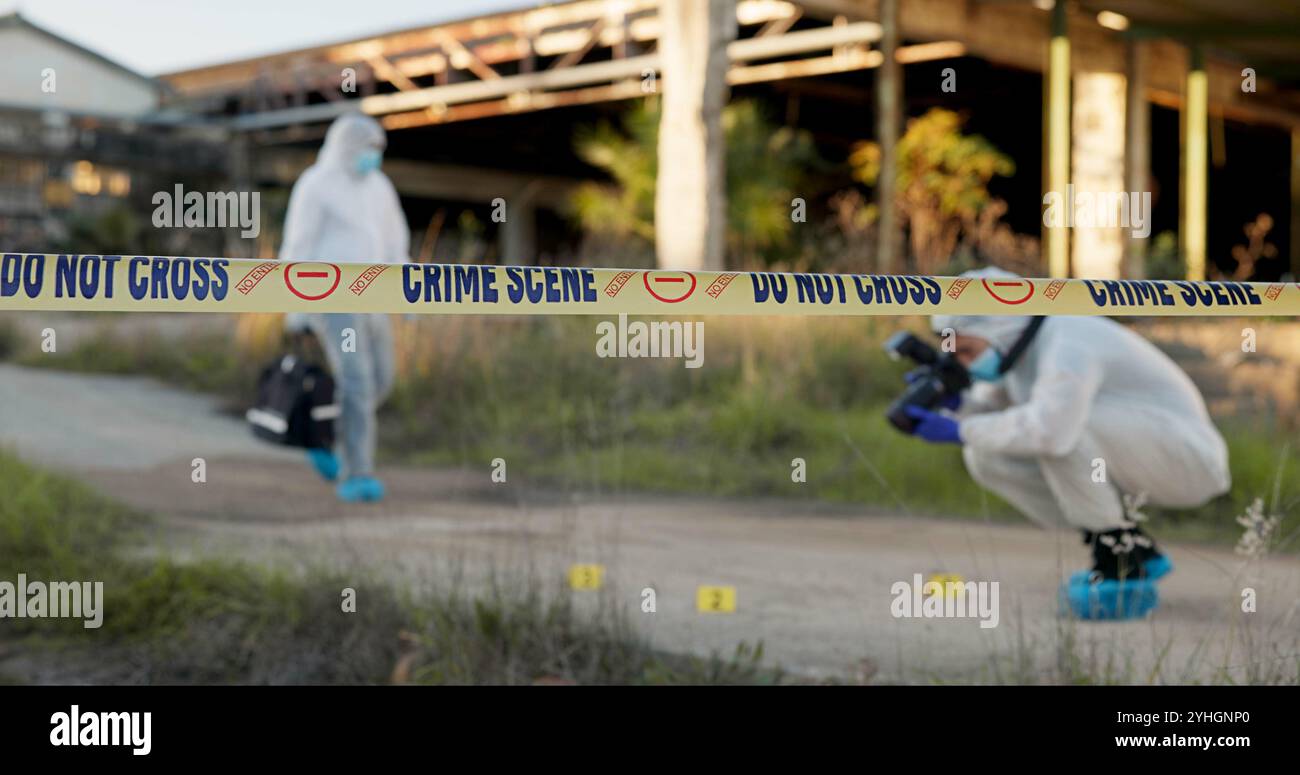 Crime scene, people and tape outdoor for forensics, evidence ...