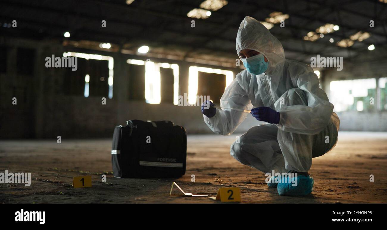 Person, swab and investigation at crime scene, blood sample and ...