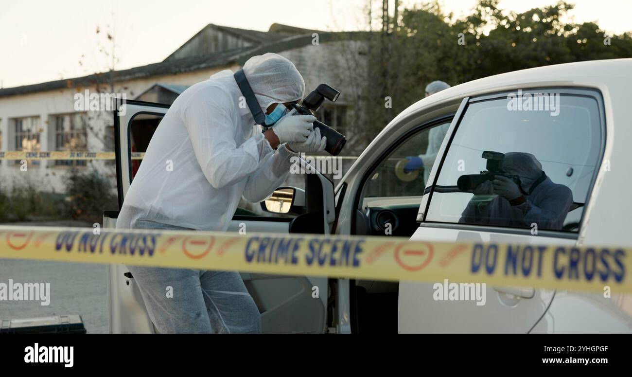 Detective, tape and crime scene of car evidence with photography ...