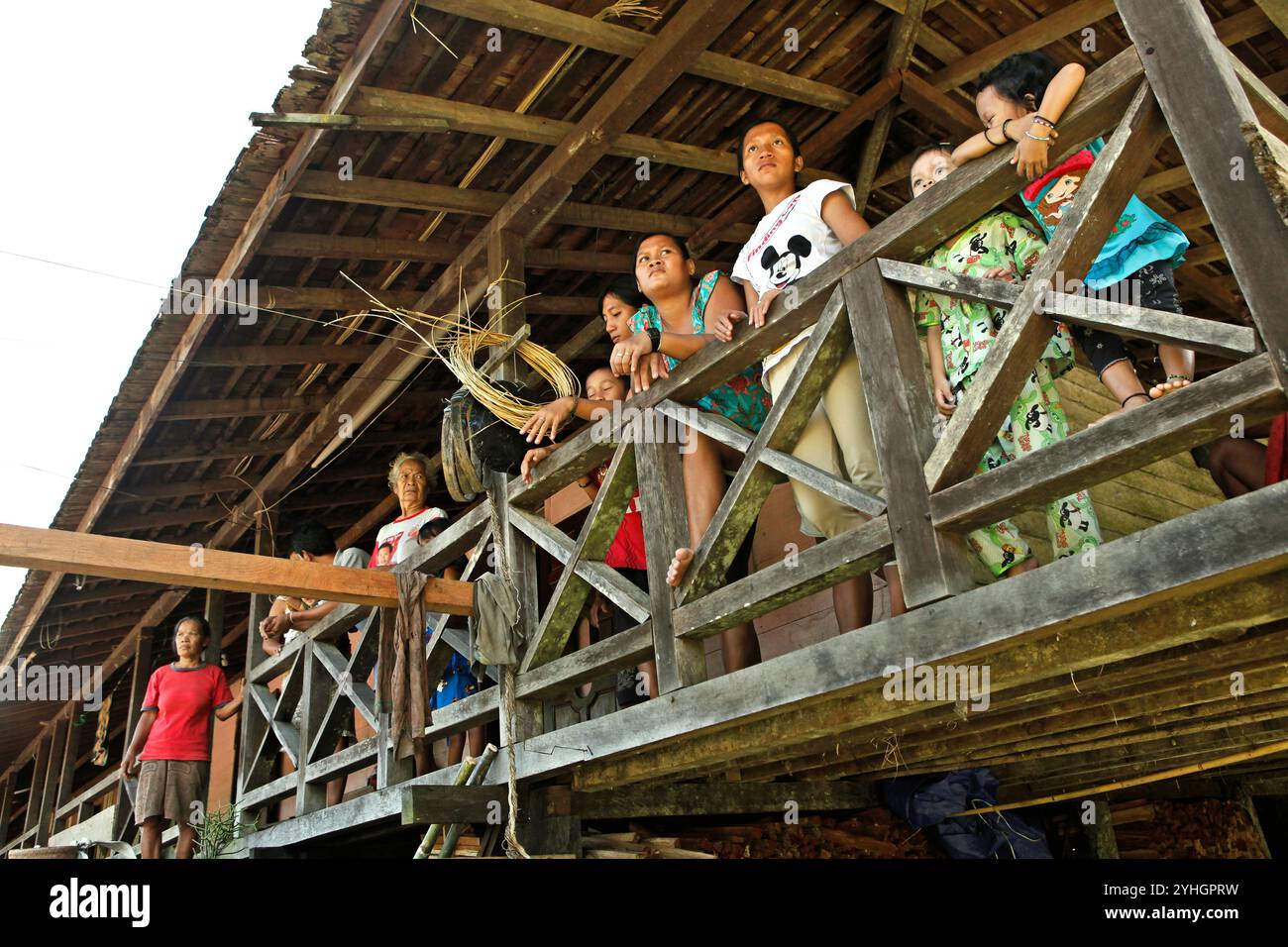 People watching a welcome ceremony during an ecotourism event at the ...
