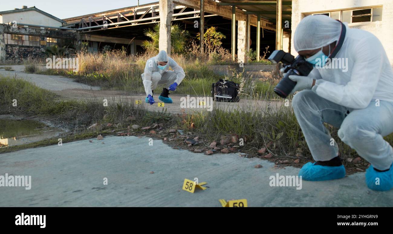 Crime scene, team and photography outdoor for forensics, evidence and ...
