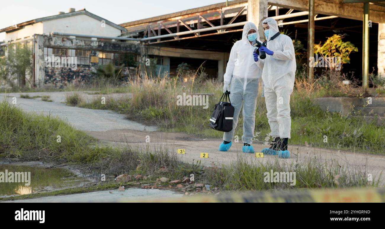 Crime scene, people and camera outdoor for forensics, evidence and ...