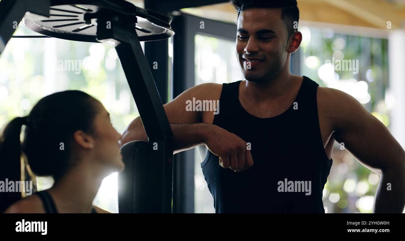 Happy man, personal trainer and woman with equipment at gym for workout ...