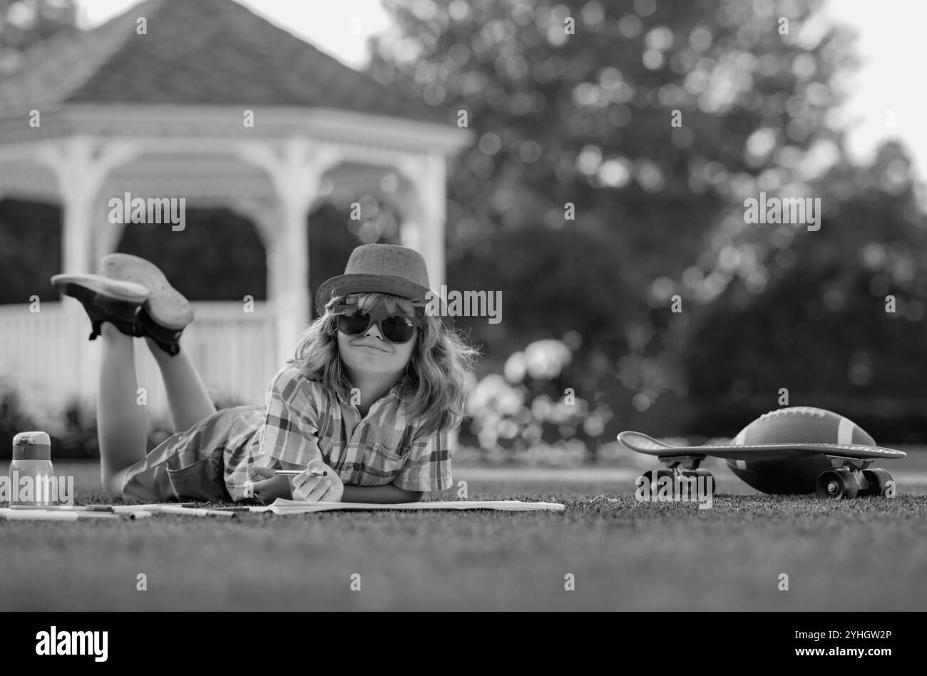 Child play and draw craft artwork homework. Child drawing picture with ...