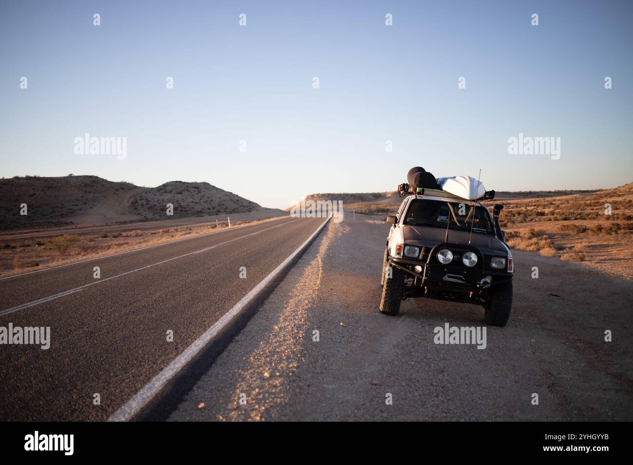Front view of a parked 4WD ute at the side of the road along the ...