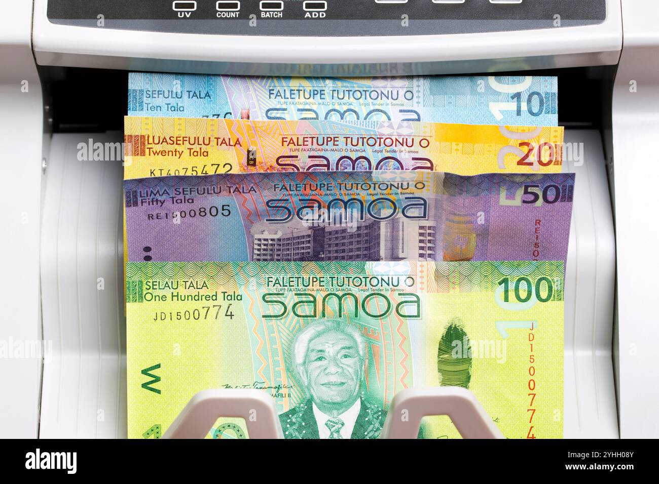 Samoan money - tala in the counting machine Stock Photo - Alamy