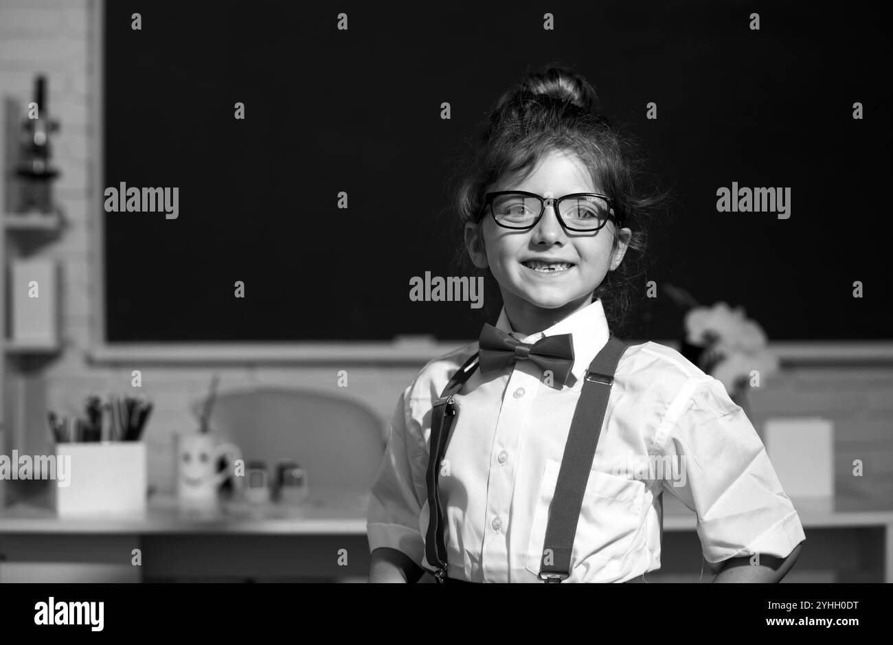 Kid girl learning lesson at school. Elementary school child in class ...