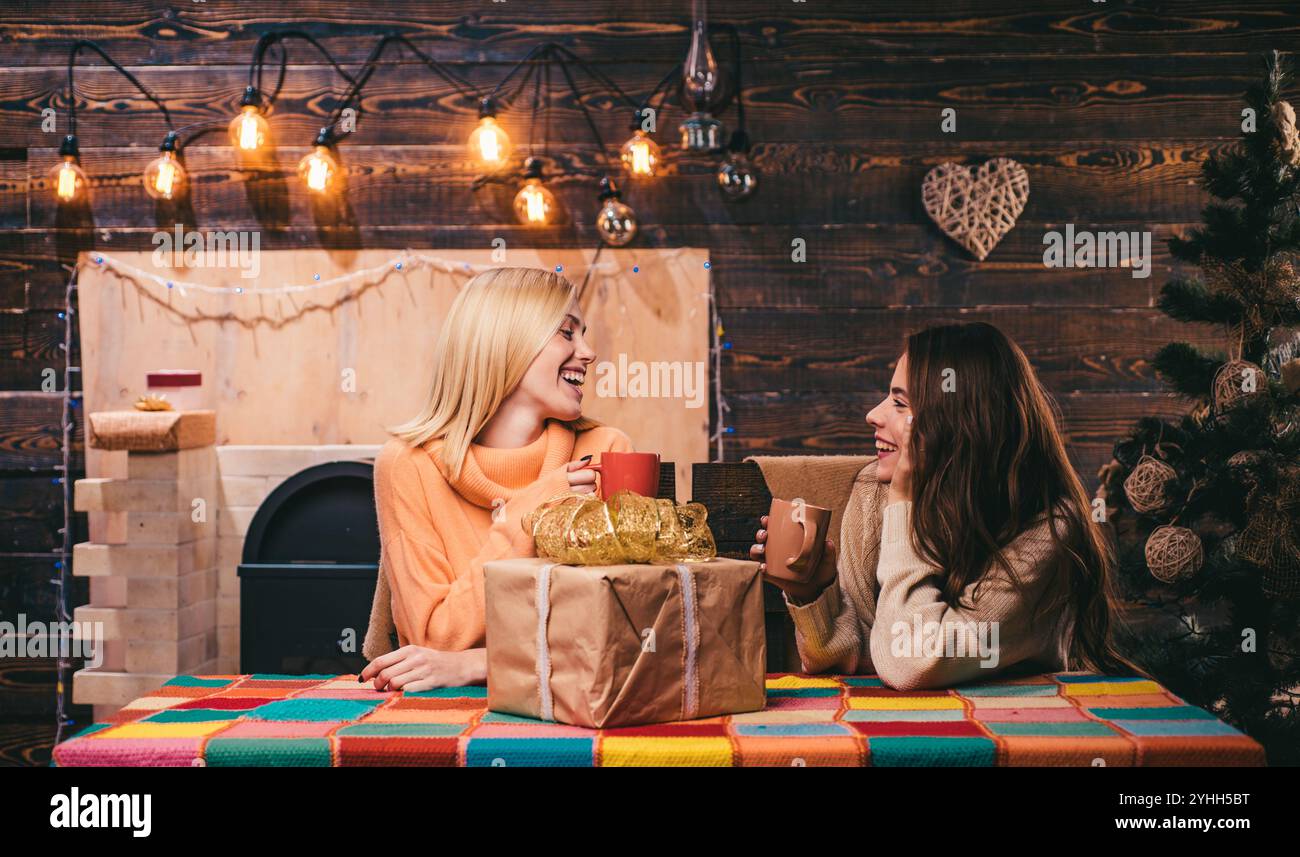 Christmas Celebration, holiday. Joyful friends in christmas at home ...