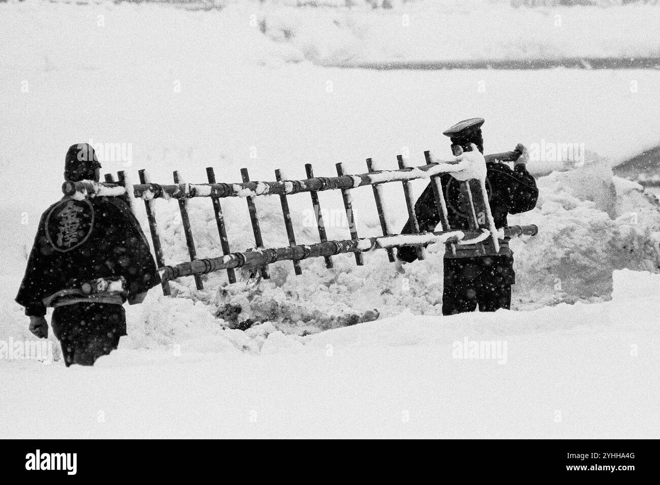 Carry a ladder Black and White Stock Photos & Images - Alamy