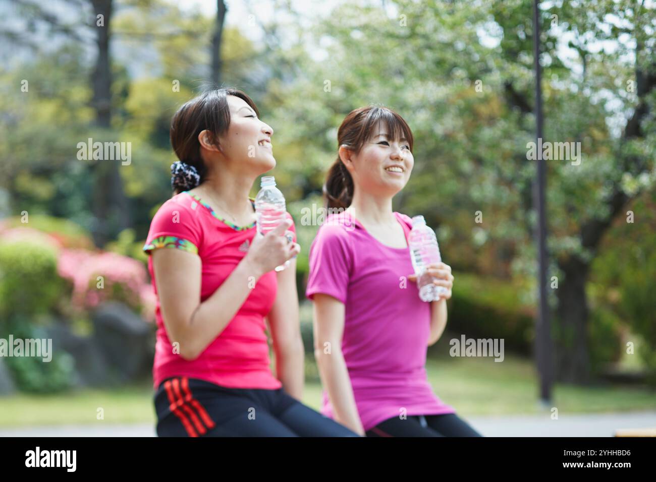 Two women hydrating Stock Photo - Alamy
