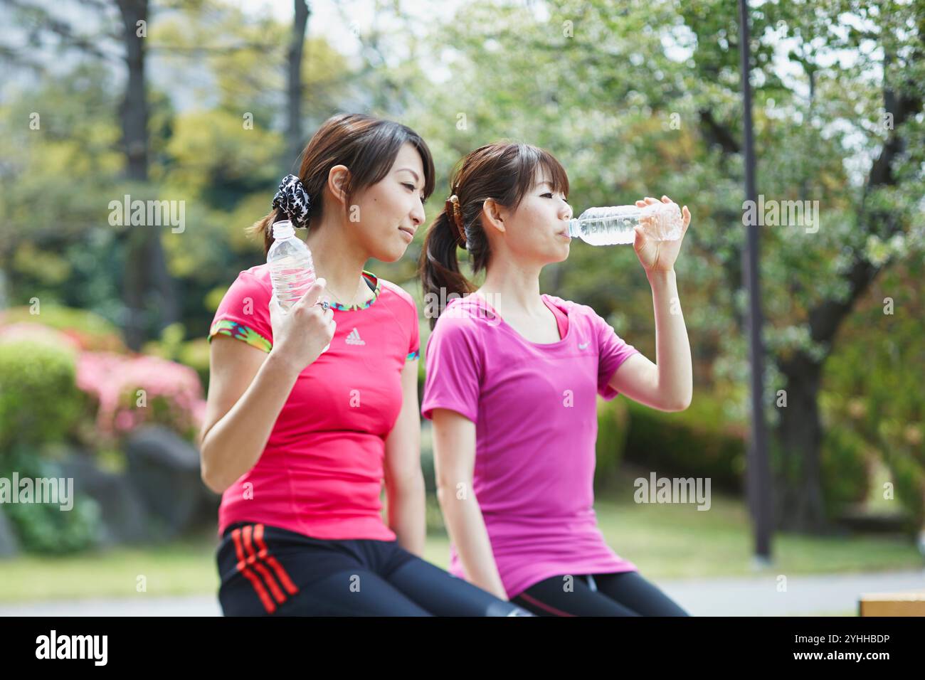 Two women hydrating Stock Photo - Alamy