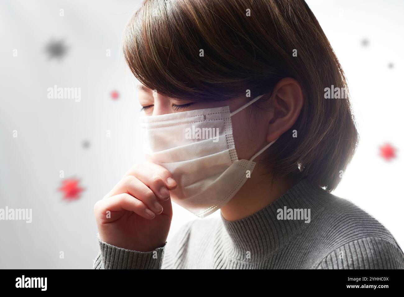 Masked woman with cough Stock Photo - Alamy