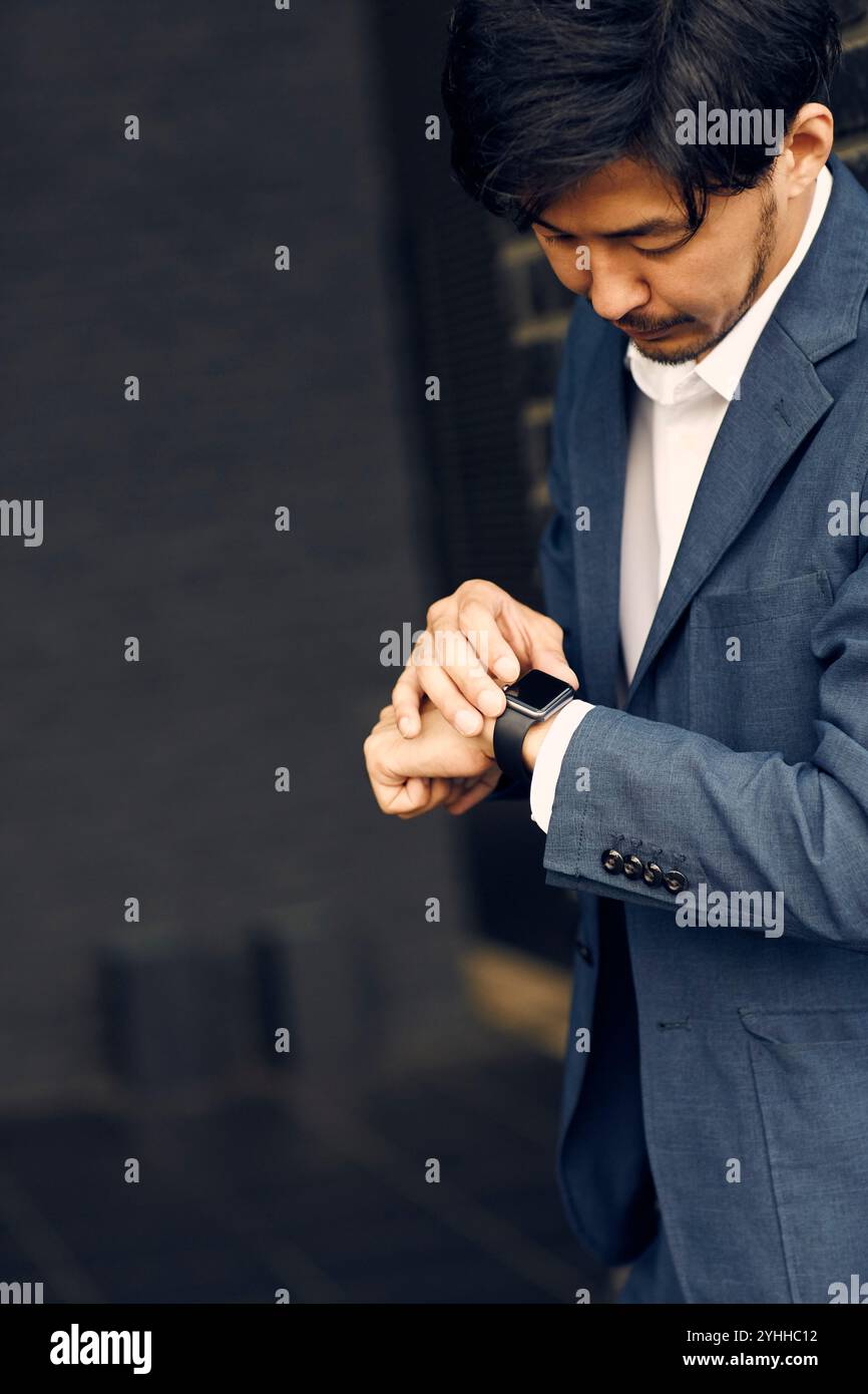 Smartwatch and businessman's hand with smartwatch Stock Photo - Alamy
