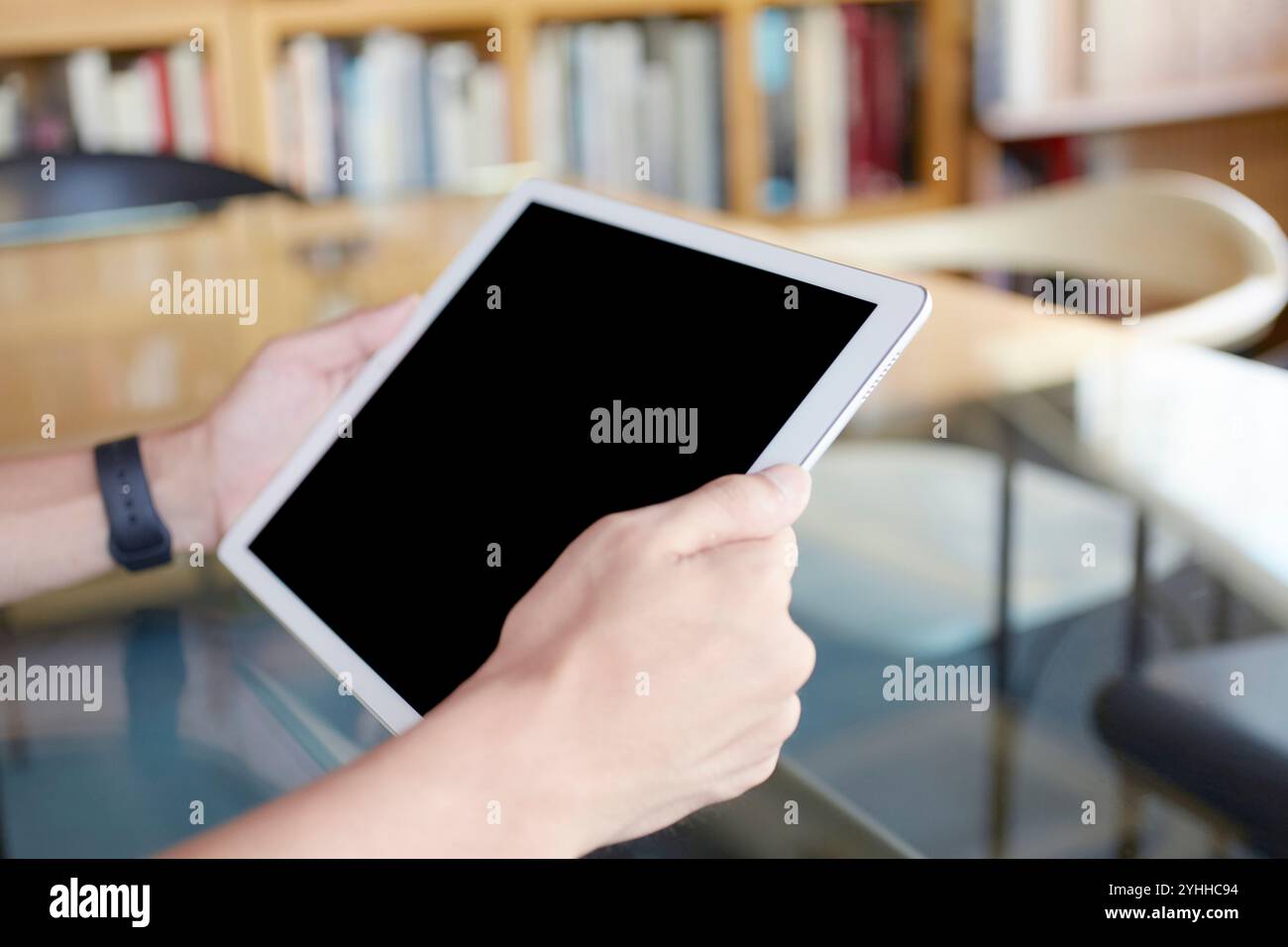 Man holding an iPad Stock Photo - Alamy