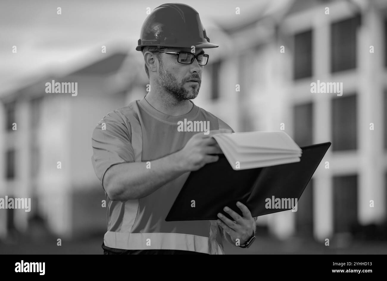Man hard hat inspection Black and White Stock Photos & Images - Alamy