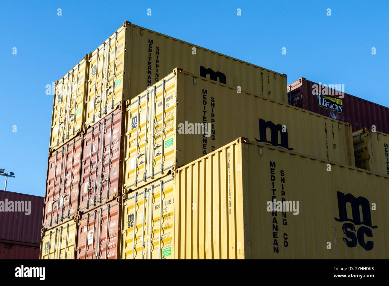 Cargo containers from msc mediterranean shipping company stacked high ...