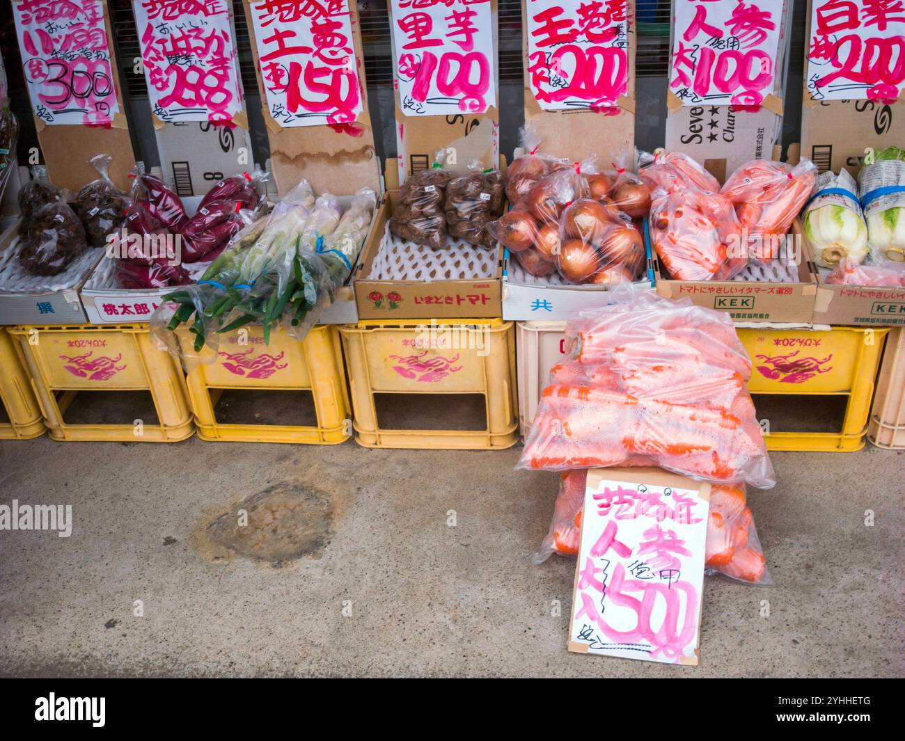 Vegetables in storefront Stock Photo - Alamy
