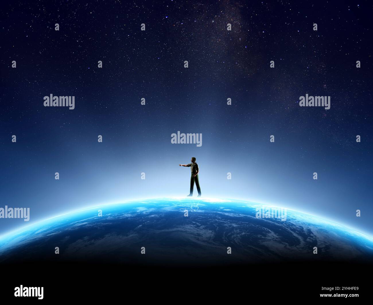 Man standing on Earth and pointing Stock Photo - Alamy