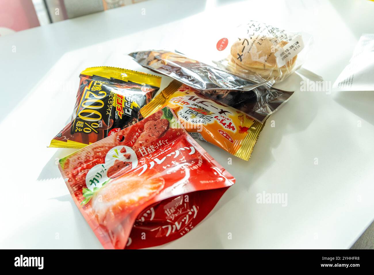 Tasting popular Japanese snacks in a lively convenience store in Tokyo ...