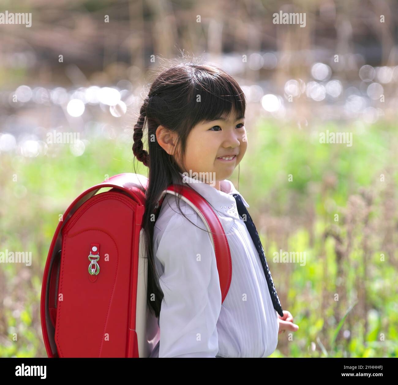 First-year primary school girl with first-year primary school student ...