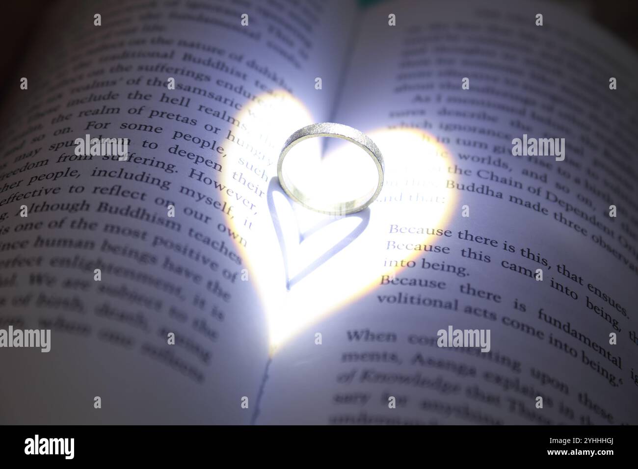Heart-shaped light and ring Stock Photo - Alamy
