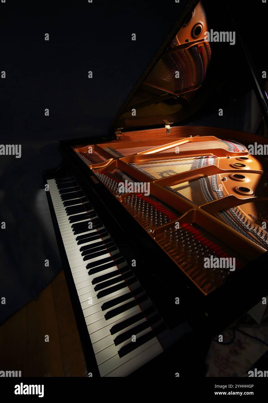 Grand piano and glowing string section Stock Photo - Alamy